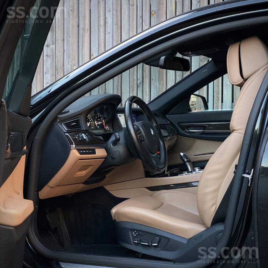 Black BMW 730 2010 in Riga, with an engine capacity of 3.00 L and mileage of 262 thousand km for 8350 €, photo 12 on AUTOMOTO.COM.LV