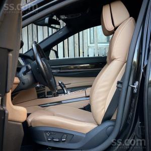 Black BMW 730 2010 in Riga, with an engine capacity of 3.00 L and mileage of 262 thousand km for 8350 €, photo 13 on AUTOMOTO.COM.LV