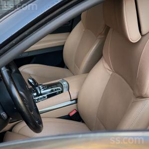 Black BMW 730 2010 in Riga, with an engine capacity of 3.00 L and mileage of 262 thousand km for 8350 €, photo 14 on AUTOMOTO.COM.LV