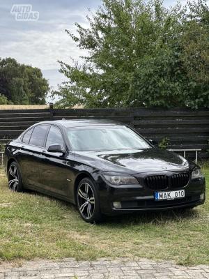 Black BMW 730 2010 in Siauliai, with an engine capacity of 3.00 L and mileage of 323 thousand km for 8100 €, photo  on AUTOMOTO.COM.LV