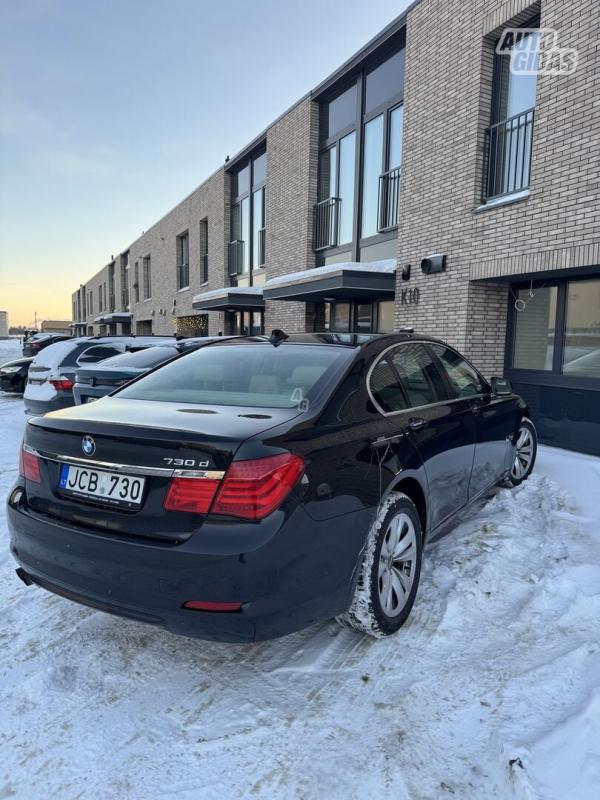 Black BMW 730 2011 in Klaipeda, with an engine capacity of 3.00 L and mileage of 206 thousand km for 7900 €, photo 5 on AUTOMOTO.COM.LV