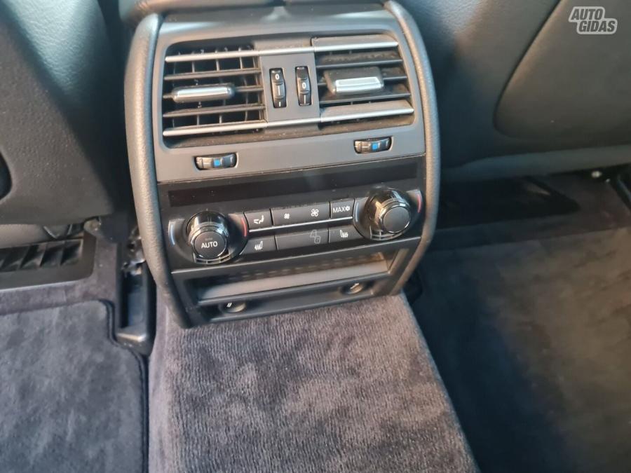 Black BMW 730 2011 in Marijampole, with an engine capacity of 3.00 L and mileage of 80 thousand km for 14500 €, photo 20 on AUTOMOTO.COM.LV