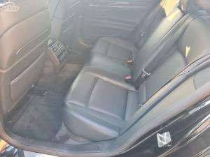 Black BMW 730 2011 in Marijampole, with an engine capacity of 3.00 L and mileage of 80 thousand km for 14500 €, photo 26 on AUTOMOTO.COM.LV