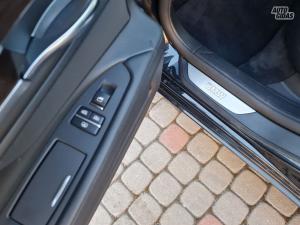 Black BMW 730 2011 in Marijampole, with an engine capacity of 3.00 L and mileage of 80 thousand km for 14500 €, photo 27 on AUTOMOTO.COM.LV