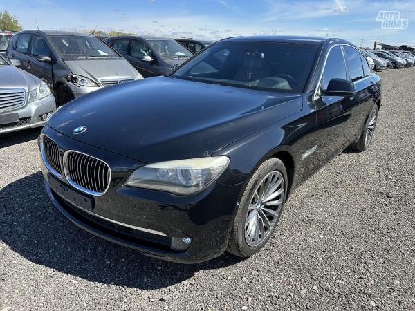Black BMW 730 2011 in Giraite, with an engine capacity of 3.00 L and mileage of 213 thousand km for 8850 €, photo 1 on AUTOMOTO.COM.LV