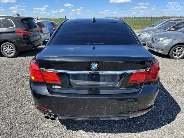 Black BMW 730 2011 in Giraite, with an engine capacity of 3.00 L and mileage of 213 thousand km for 8850 €, photo 6 on AUTOMOTO.COM.LV