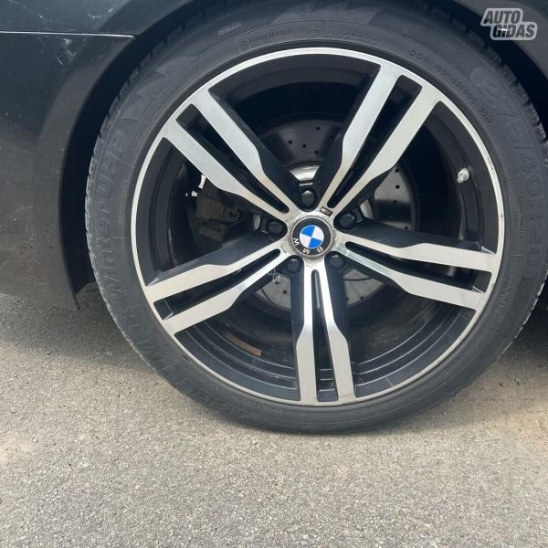 Black BMW 730 2011 in Vilnius, with an engine capacity of 3.00 L and mileage of 455 thousand km for 9900 €, photo 4 on AUTOMOTO.COM.LV