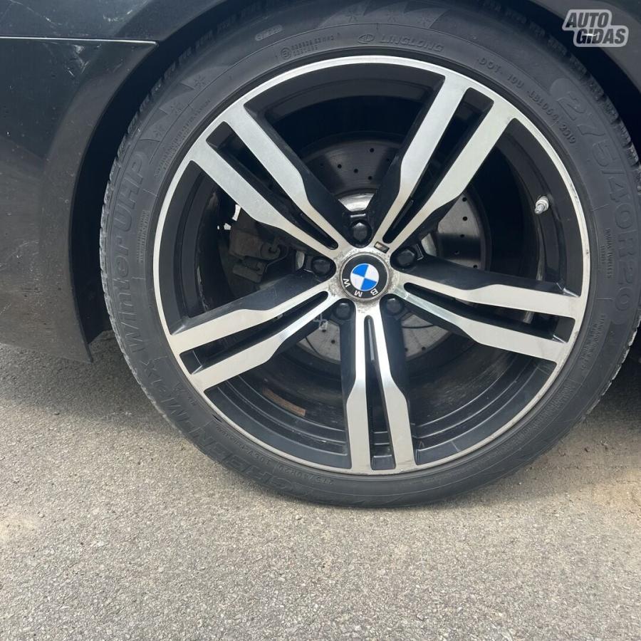 Black BMW 730 2011 in Vilnius, with an engine capacity of 3.00 L and mileage of 455 thousand km for 9900 €, photo 5 on AUTOMOTO.COM.LV