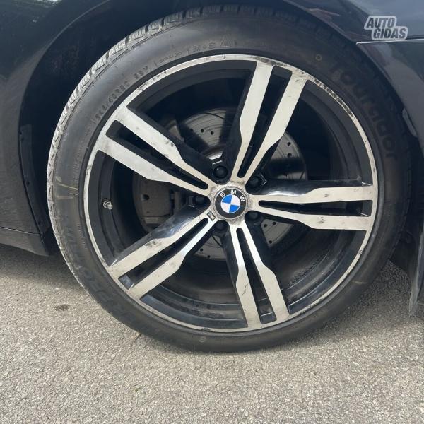 Black BMW 730 2011 in Vilnius, with an engine capacity of 3.00 L and mileage of 455 thousand km for 9900 €, photo 5 on AUTOMOTO.COM.LV