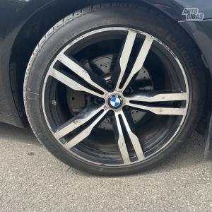 Black BMW 730 2011 in Vilnius, with an engine capacity of 3.00 L and mileage of 455 thousand km for 9900 €, photo 6 on AUTOMOTO.COM.LV