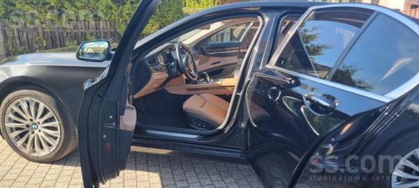 Black BMW 730 2011 in Riga, with an engine capacity of 3.00 L and mileage of 394 thousand km for 11500 €, photo 4 on AUTOMOTO.COM.LV