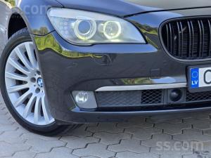 Black BMW 730 2011 in Riga, with an engine capacity of 3.00 L and mileage of 317 thousand km for 12000 €, photo 19 on AUTOMOTO.COM.LV