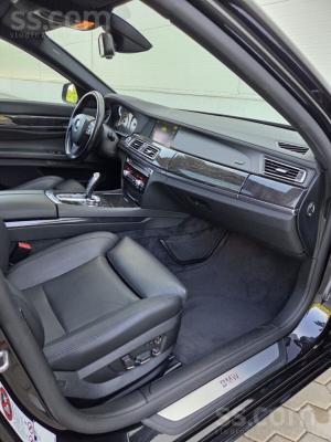 Black BMW 730 2011 in Riga, with an engine capacity of 3.00 L and mileage of 317 thousand km for 12000 €, photo 26 on AUTOMOTO.COM.LV