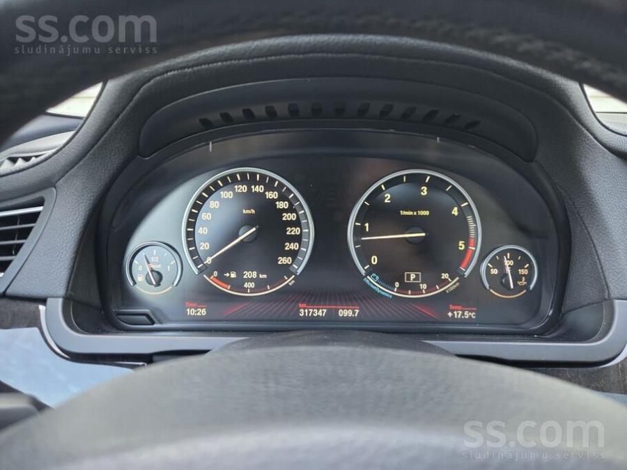 Black BMW 730 2011 in Riga, with an engine capacity of 3.00 L and mileage of 317 thousand km for 12000 €, photo 30 on AUTOMOTO.COM.LV