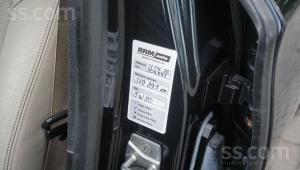 Black BMW 730 2011 in Riga, with an engine capacity of 3.00 L and mileage of 314 thousand km for 9950 €, photo 11 on AUTOMOTO.COM.LV