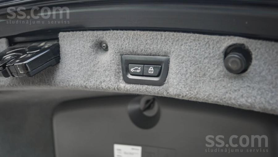 Black BMW 730 2011 in Riga, with an engine capacity of 3.00 L and mileage of 314 thousand km for 9950 €, photo 14 on AUTOMOTO.COM.LV