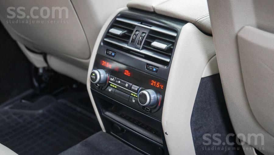 Black BMW 730 2011 in Riga, with an engine capacity of 3.00 L and mileage of 314 thousand km for 9950 €, photo 16 on AUTOMOTO.COM.LV
