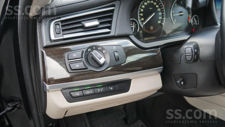 Black BMW 730 2011 in Riga, with an engine capacity of 3.00 L and mileage of 314 thousand km for 9950 €, photo 21 on AUTOMOTO.COM.LV
