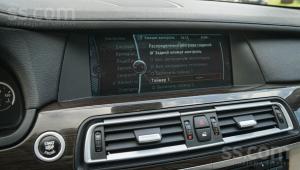 Black BMW 730 2011 in Riga, with an engine capacity of 3.00 L and mileage of 314 thousand km for 9950 €, photo 27 on AUTOMOTO.COM.LV