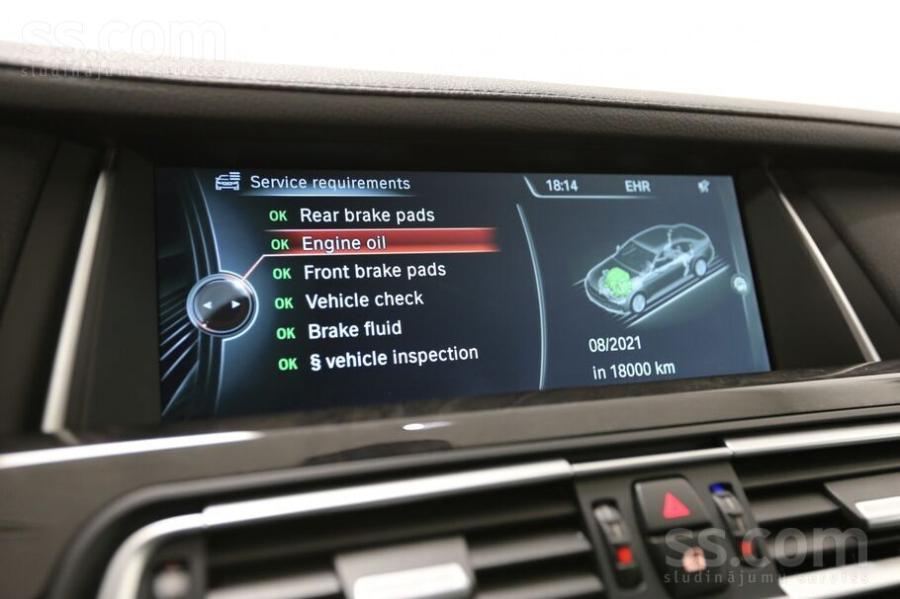 Black BMW 730 2012 in Riga, with an engine capacity of 3.00 L and mileage of 162 thousand km for 16000 €, photo 11 on AUTOMOTO.COM.LV