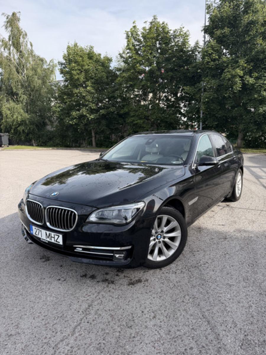 Black BMW 730 2013 in Tallinn, with an engine capacity of 3.00 L and mileage of 227 thousand km for 15800 €, photo 1 on AUTOMOTO.COM.LV