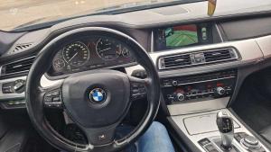 Black BMW 730 2013 in Kaunas, with an engine capacity of 2.99 L and mileage of 286 thousand km for 13450 €, photo 12 on AUTOMOTO.COM.LV
