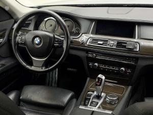 Black BMW 730 2015 in Vilnius, with an engine capacity of 2.99 L and mileage of 240 thousand km for 13990 €, photo 16 on AUTOMOTO.COM.LV