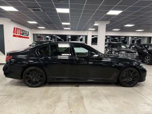 Black BMW 730 2016 in Klaipeda, with an engine capacity of 3.00 L and mileage of 338 thousand km for 20950 €, photo 6 on AUTOMOTO.COM.LV