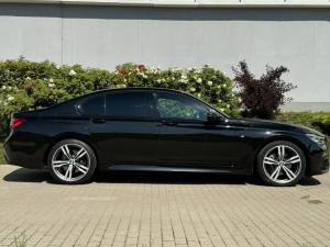 Black BMW 730 2016 in Riga, with an engine capacity of 3.00 L and mileage of 188 thousand km for 31490 €, photo 6 on AUTOMOTO.COM.LV
