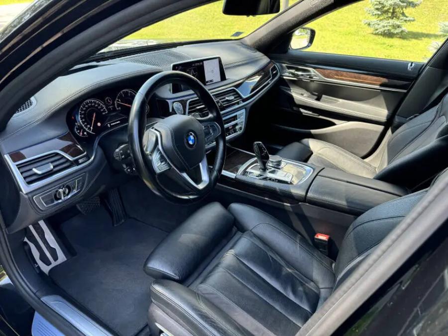 Black BMW 730 2016 in Riga, with an engine capacity of 3.00 L and mileage of 188 thousand km for 31490 €, photo 10 on AUTOMOTO.COM.LV