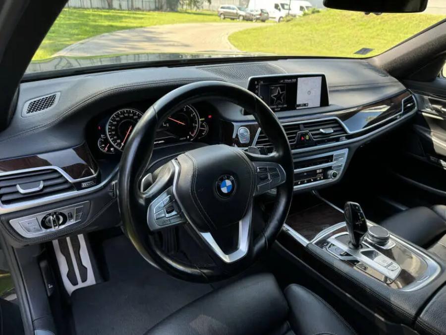 Black BMW 730 2016 in Riga, with an engine capacity of 3.00 L and mileage of 188 thousand km for 31490 €, photo 12 on AUTOMOTO.COM.LV