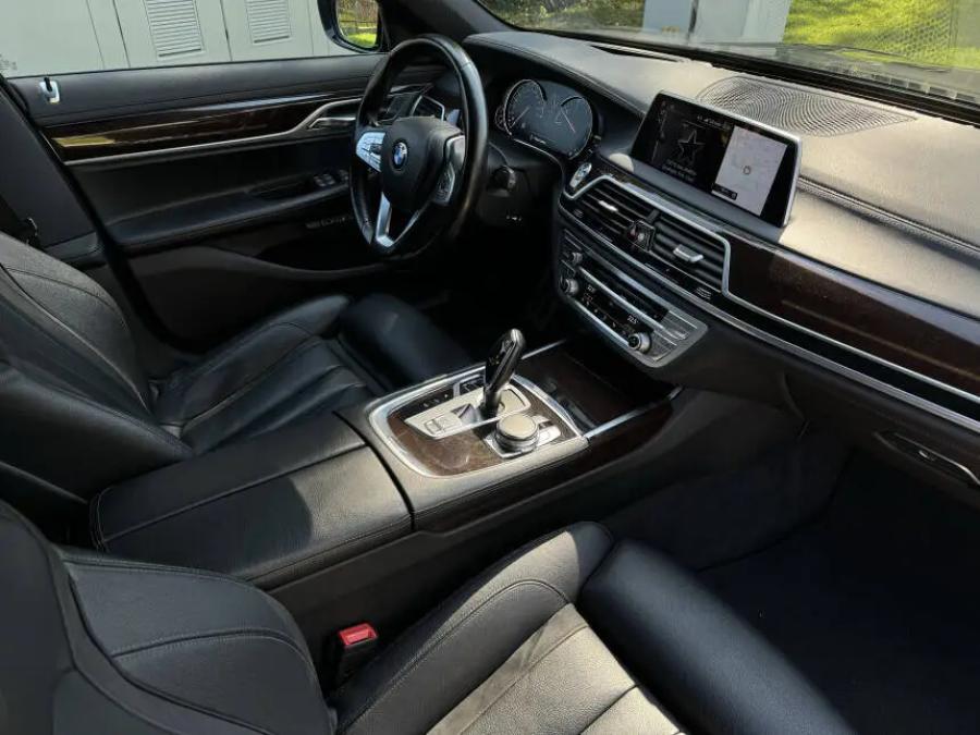 Black BMW 730 2016 in Riga, with an engine capacity of 3.00 L and mileage of 188 thousand km for 31490 €, photo 15 on AUTOMOTO.COM.LV
