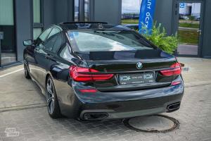 Black BMW 730 2016 in Kaunas, with an engine capacity of 3.00 L and mileage of 287 thousand km for 20950 €, photo 11 on AUTOMOTO.COM.LV
