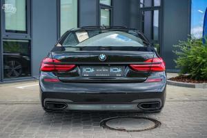 Black BMW 730 2016 in Kaunas, with an engine capacity of 3.00 L and mileage of 287 thousand km for 20950 €, photo 12 on AUTOMOTO.COM.LV