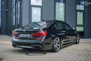 Black BMW 730 2016 in Kaunas, with an engine capacity of 3.00 L and mileage of 287 thousand km for 20950 €, photo 14 on AUTOMOTO.COM.LV