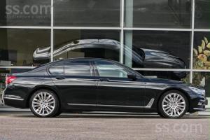 Black BMW 730 2016 in Riga, with an engine capacity of 3.00 L and mileage of 150 thousand km for 29000 €, photo 4 on AUTOMOTO.COM.LV