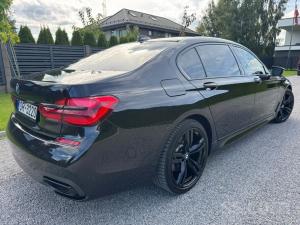 Black BMW 730 2016 in Riga, with an engine capacity of 3.00 L and mileage of 247 thousand km for 27999 €, photo 4 on AUTOMOTO.COM.LV