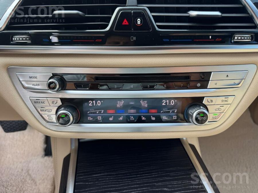 Black BMW 730 2016 in Riga, with an engine capacity of 3.00 L and mileage of 247 thousand km for 27999 €, photo 18 on AUTOMOTO.COM.LV