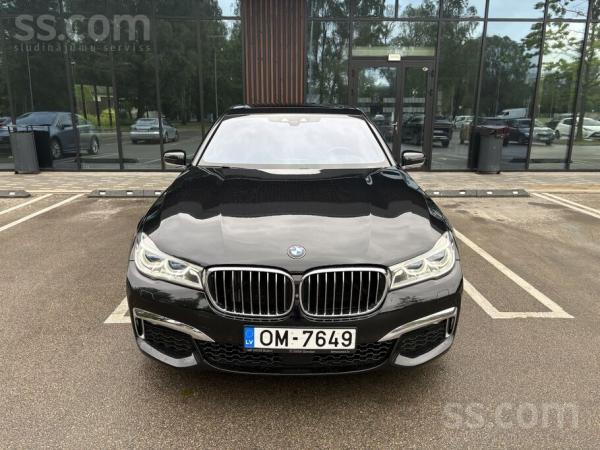 Black BMW 730 2017 in Riga, with an engine capacity of 3.00 L and mileage of 214 thousand km for 26500 €, photo 2 on AUTOMOTO.COM.LV