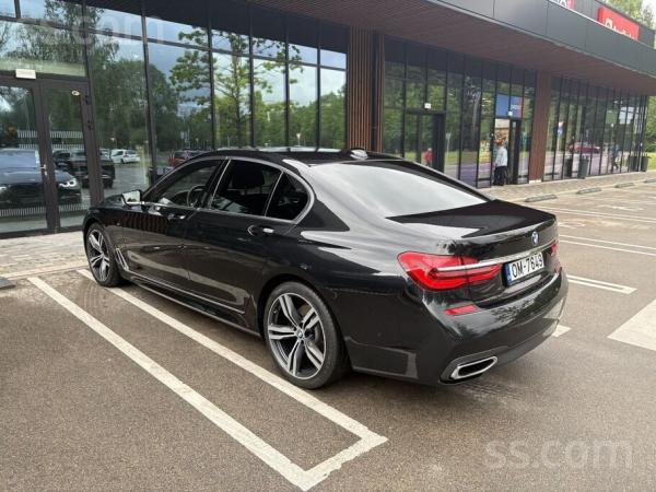 Black BMW 730 2017 in Riga, with an engine capacity of 3.00 L and mileage of 214 thousand km for 26500 €, photo 7 on AUTOMOTO.COM.LV
