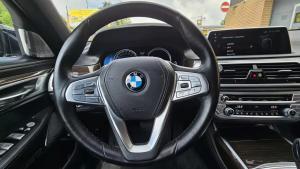Black BMW 730 2018 in Riga, with an engine capacity of 3.00 L and mileage of 98 thousand km for 39900 €, photo 17 on AUTOMOTO.COM.LV