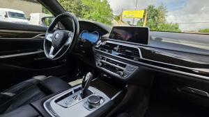 Black BMW 730 2018 in Riga, with an engine capacity of 3.00 L and mileage of 98 thousand km for 39900 €, photo 24 on AUTOMOTO.COM.LV