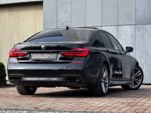 Black BMW 730 2018 in Riga, with an engine capacity of 3.00 L and mileage of 186 thousand km for 30800 €, photo 3 on AUTOMOTO.COM.LV