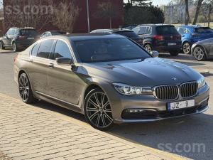 Brown BMW 730 2018 in Ogre, with an engine capacity of 3.00 L and mileage of 165 thousand km for 27700 €, photo 3 on AUTOMOTO.COM.LV