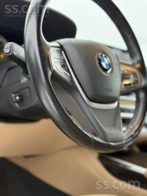 Brown BMW 730 2018 in Ogre, with an engine capacity of 3.00 L and mileage of 165 thousand km for 27700 €, photo 13 on AUTOMOTO.COM.LV