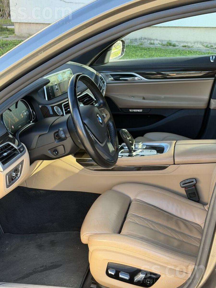 Brown BMW 730 2018 in Ogre, with an engine capacity of 3.00 L and mileage of 165 thousand km for 27700 €, photo 20 on AUTOMOTO.COM.LV