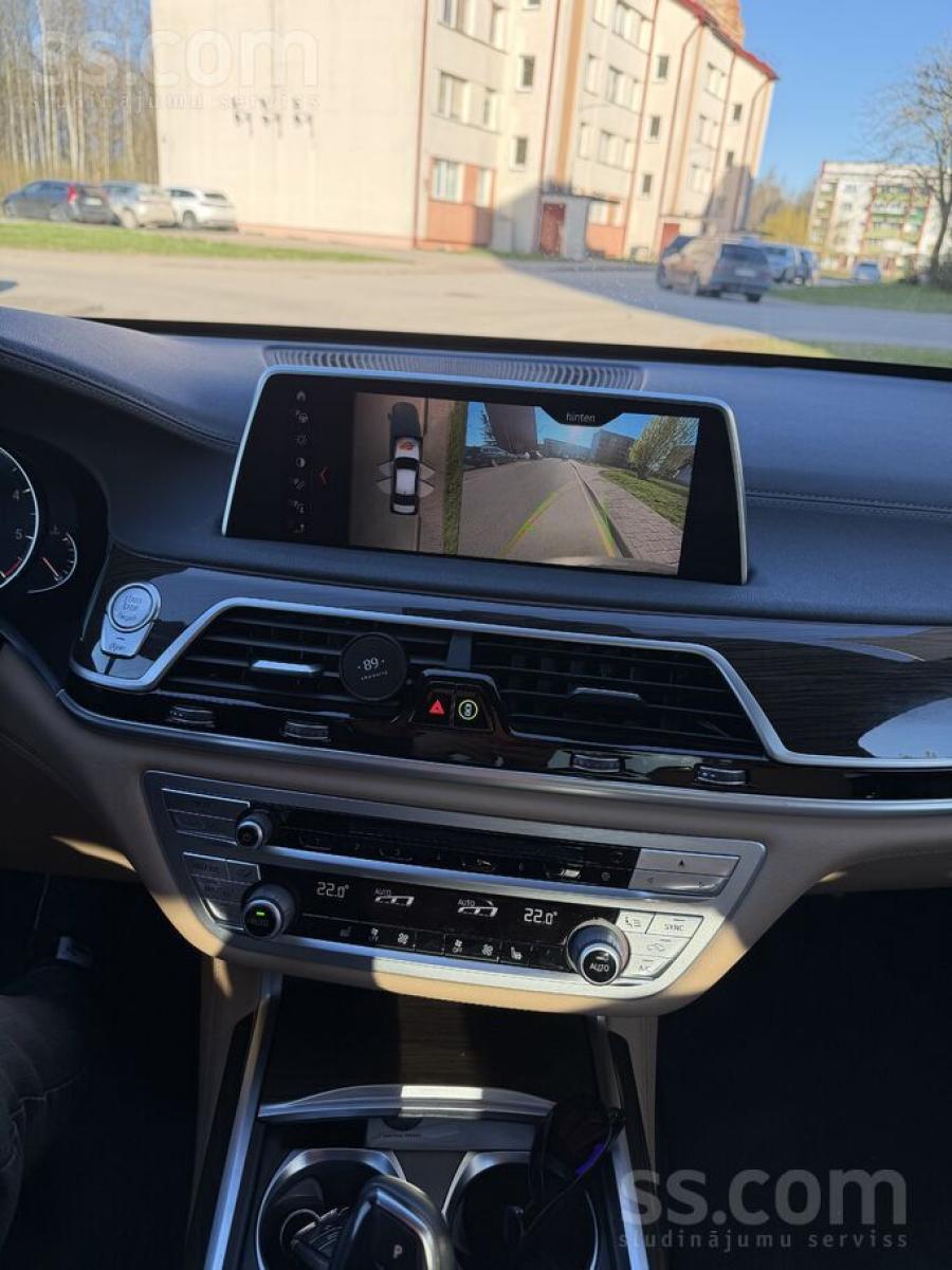 Brown BMW 730 2018 in Ogre, with an engine capacity of 3.00 L and mileage of 165 thousand km for 27700 €, photo 22 on AUTOMOTO.COM.LV