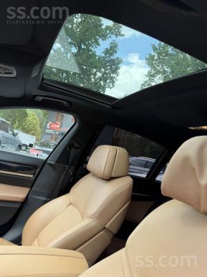 Grey BMW 730 2010 in Riga, with an engine capacity of 3.00 L and mileage of 340 thousand km for 6990 €, photo 11 on AUTOMOTO.COM.LV