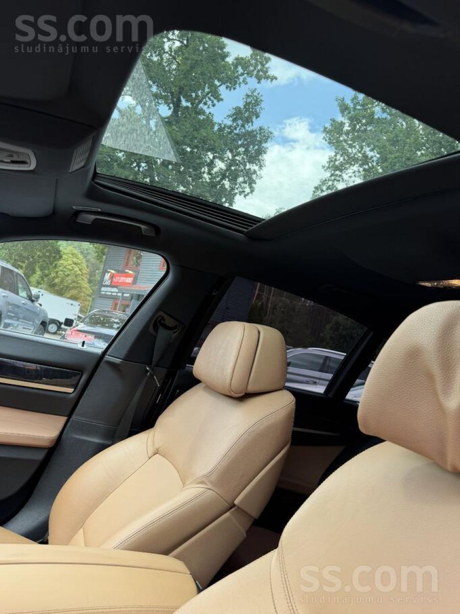 Grey BMW 730 2010 in Riga, with an engine capacity of 3.00 L and mileage of 340 thousand km for 6990 €, photo 11 on AUTOMOTO.COM.LV