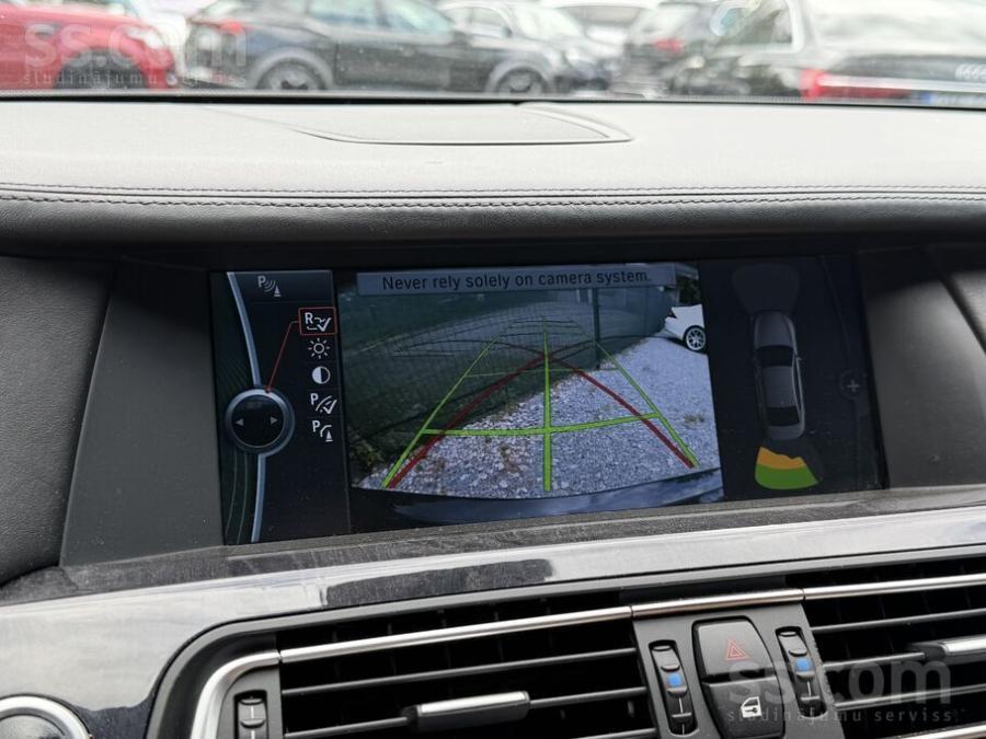 Grey BMW 730 2010 in Riga, with an engine capacity of 3.00 L and mileage of 340 thousand km for 6990 €, photo 14 on AUTOMOTO.COM.LV